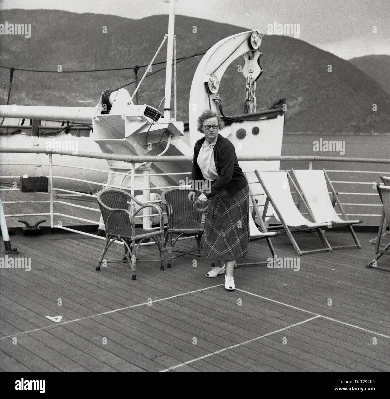 1950s, female passenger playing a deck game aboard the P & O ship, the ...
