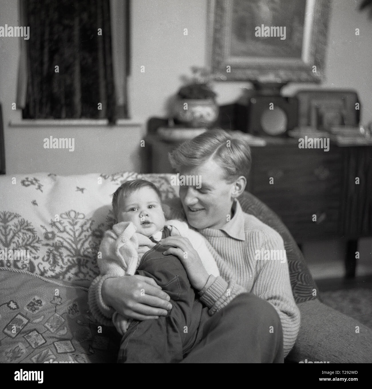 1950s, historical young father with infant child, England, UK Stock ...