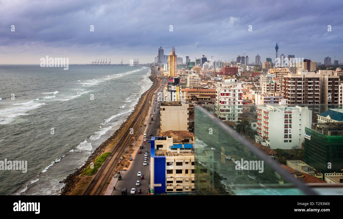 Elevated view of downtown Colombo with coast and railway line in ...