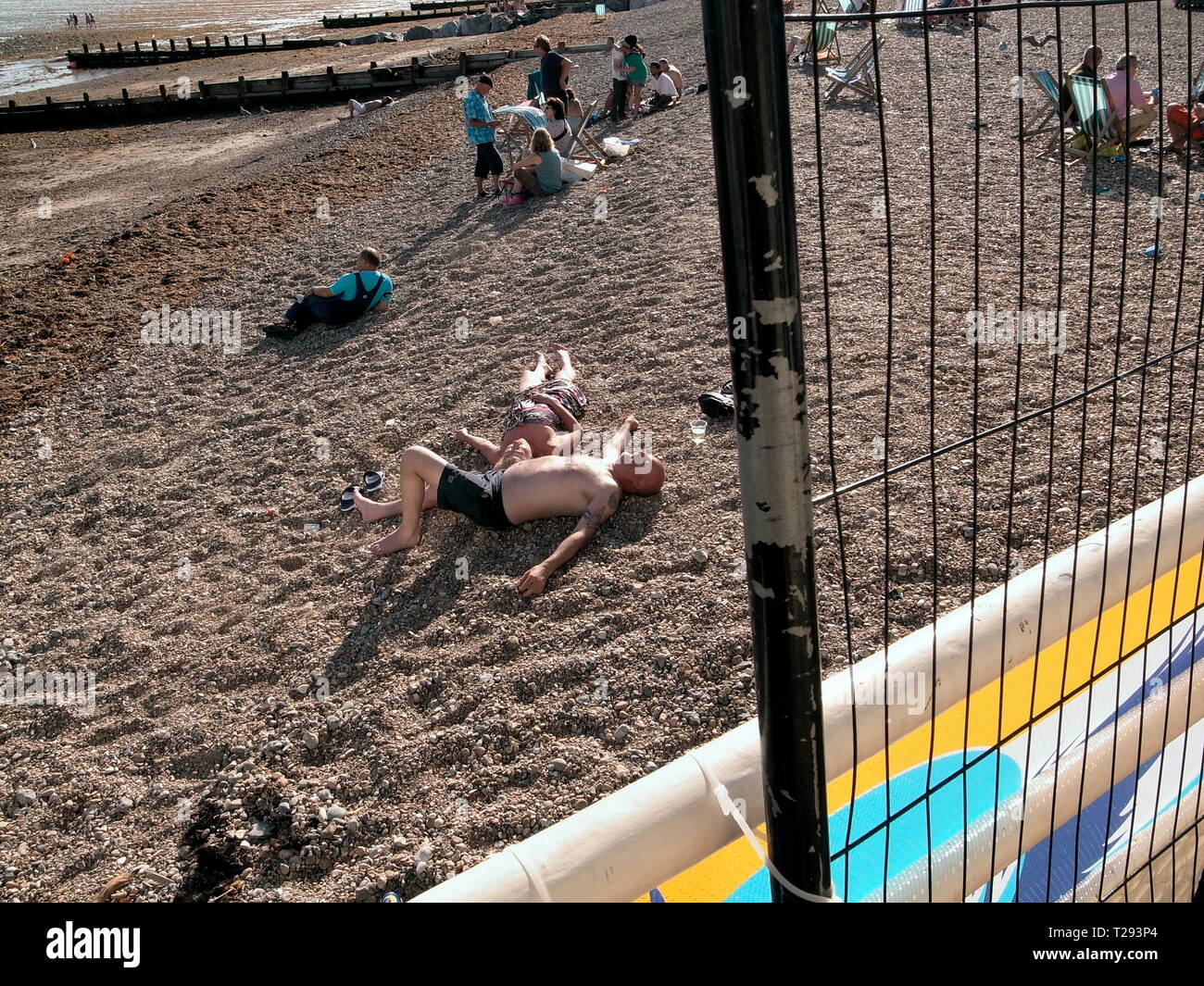 Stripping on the beach hi-res stock photography and images - Alamy