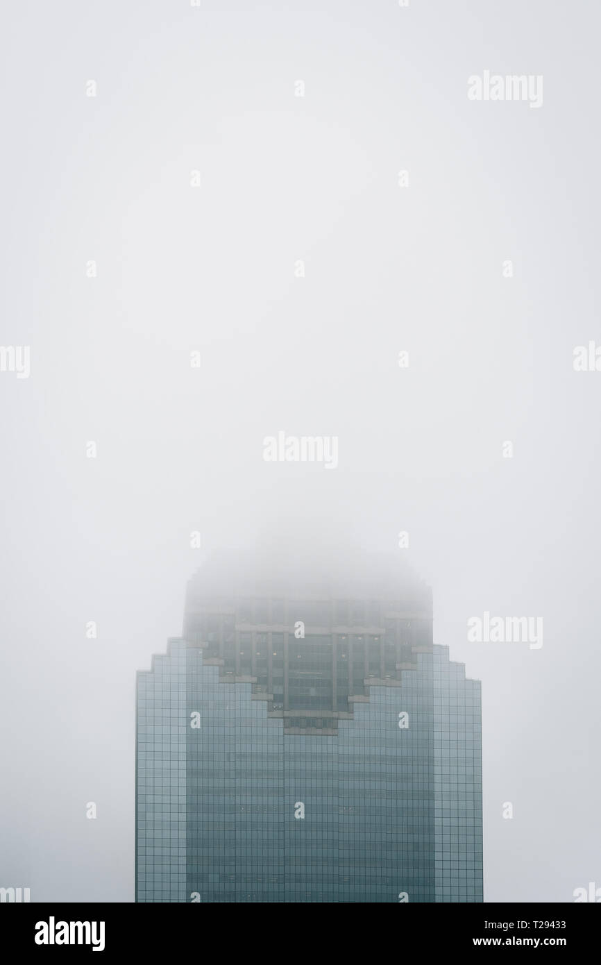 Modern skyscraper in fog hi-res stock photography and images - Alamy