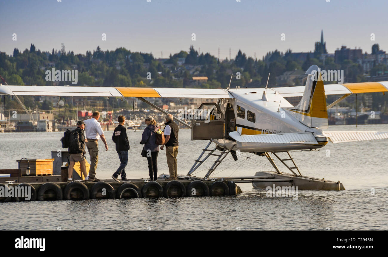SEATTLE WA, USA - JUNE 2018: Passengers boarding a De Havilland Beaver ...