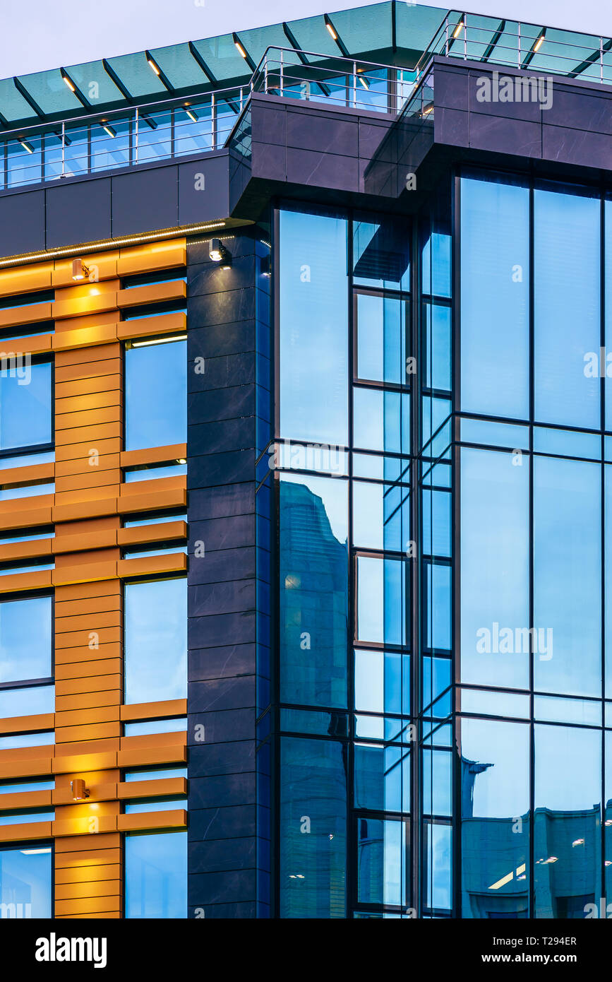 Modern high-rise office building with a glass facade, background Stock ...