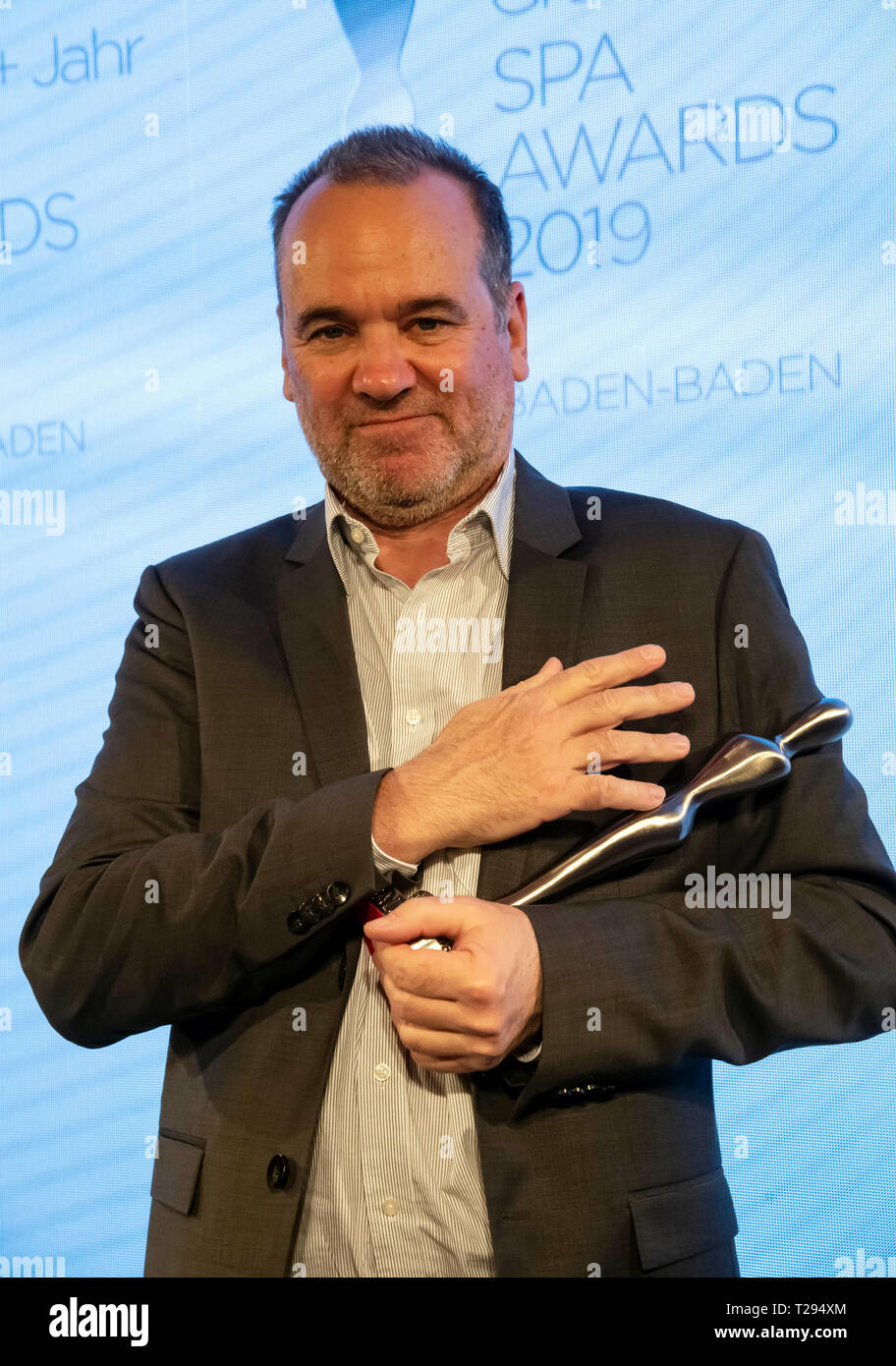 Baden Baden, Germany. 31st Mar, 2019. Günther Bonin is awarded the ...
