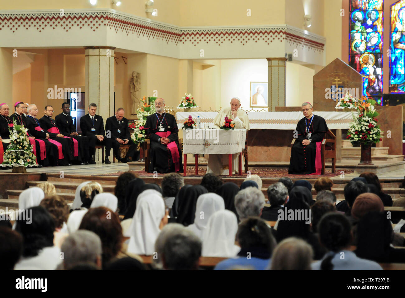 Rabat, Morocco. 31st Mar, 2019. Pope Francis (C) flanked by Archbishop ...