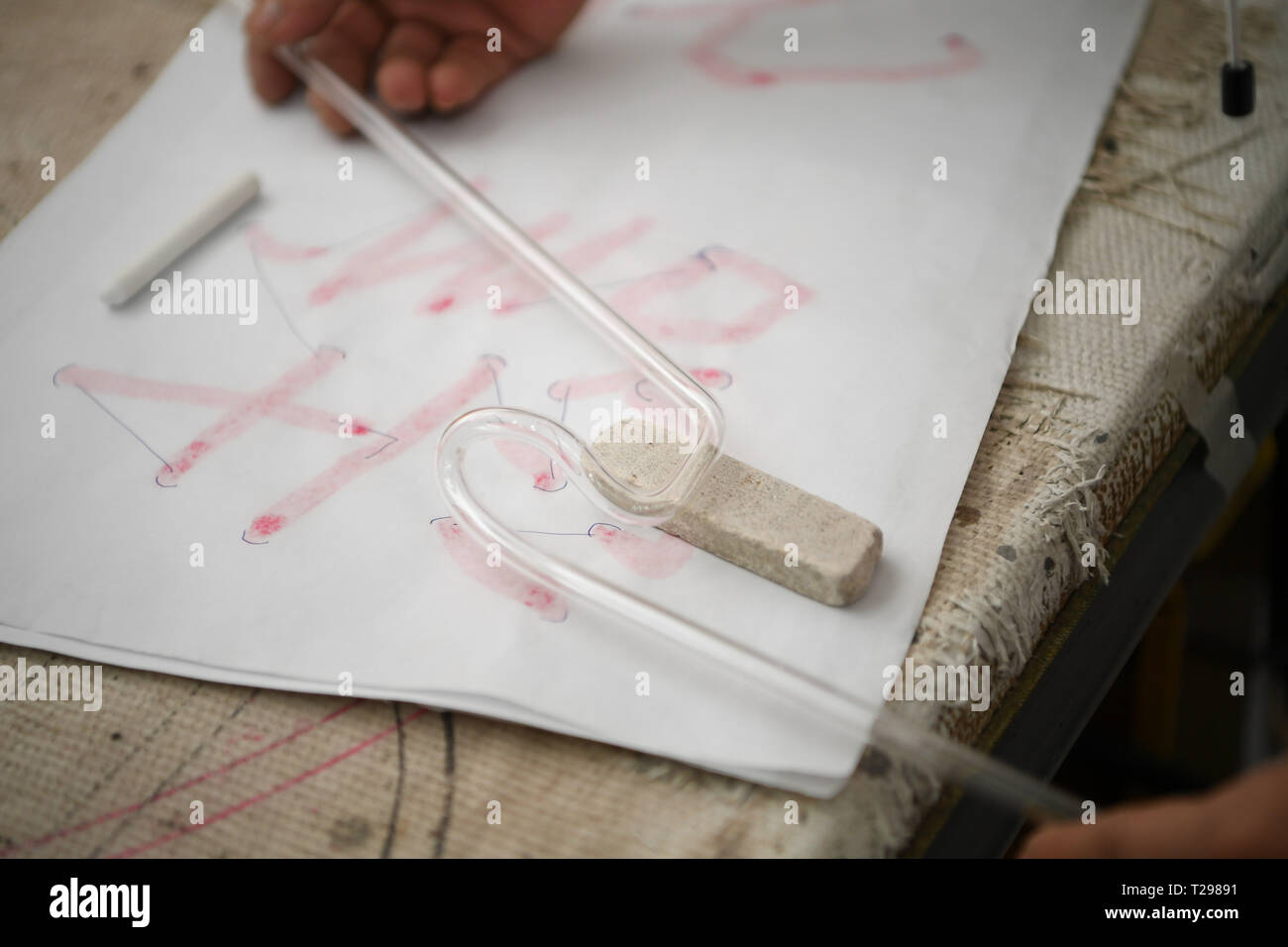 Hong Kong, China. 19th Mar, 2019. A craftsman makes neon light ...