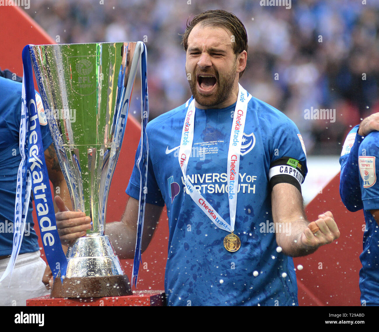 London, UK. 31st Mar, 2019. Brett Pitman celebrates with the ...