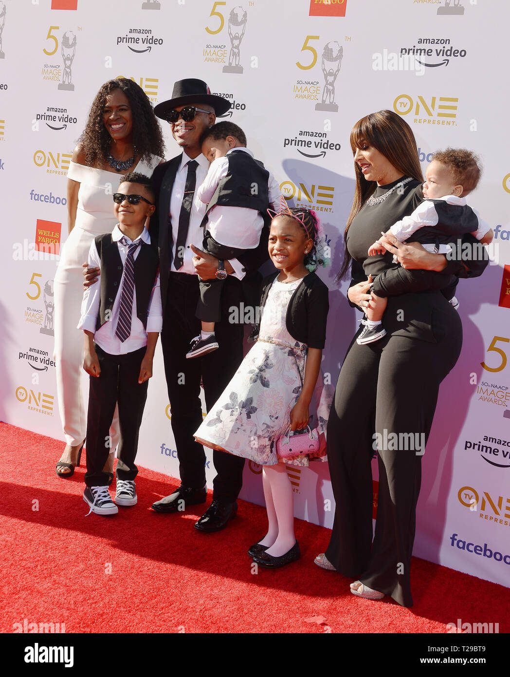California, USA. 30th Mar, 2019. Ne-Yo , wife and kids and family 045 ...