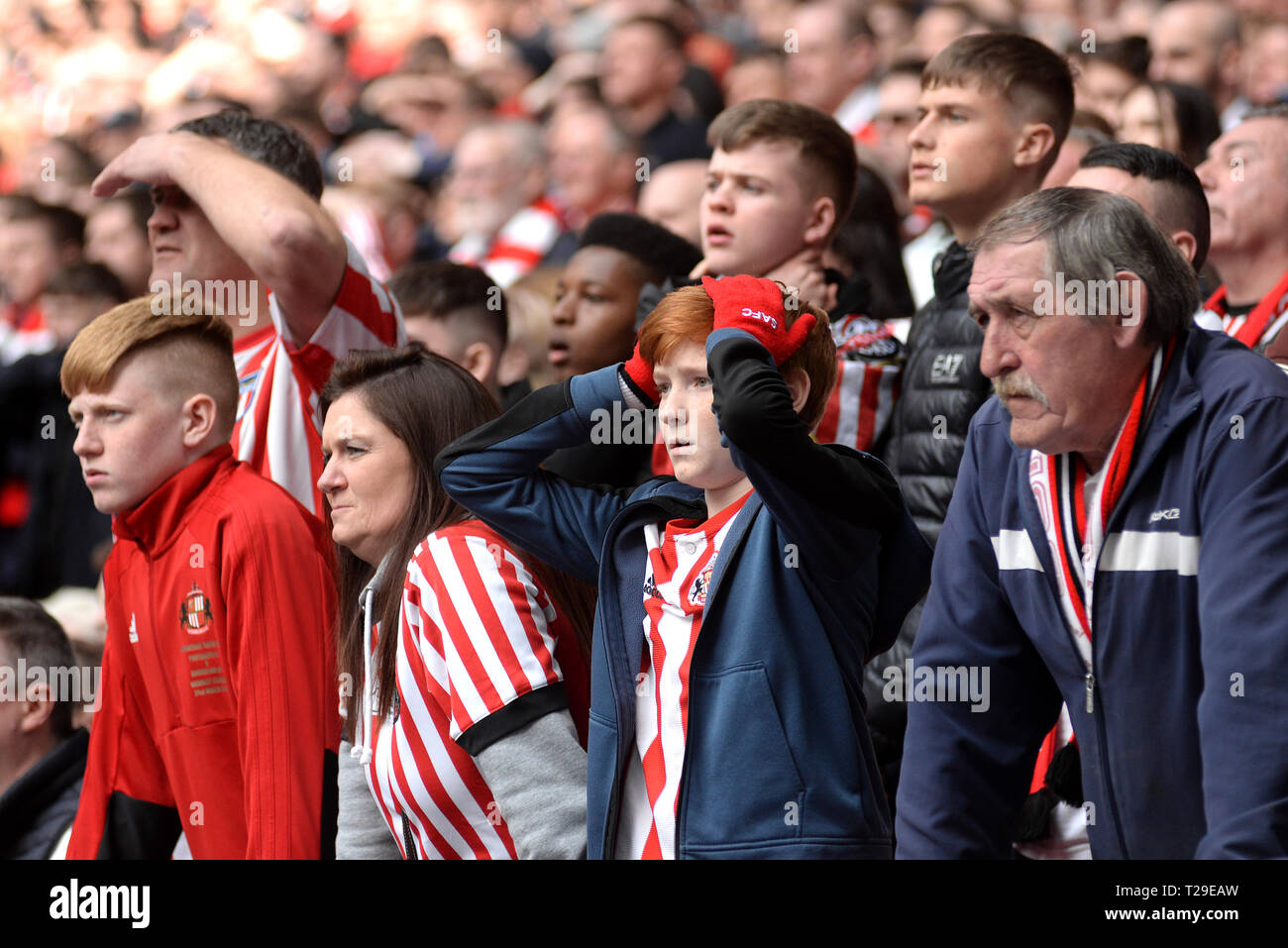London, UK. 31st Mar, 2019. Sunderland fans look dejected during the ...