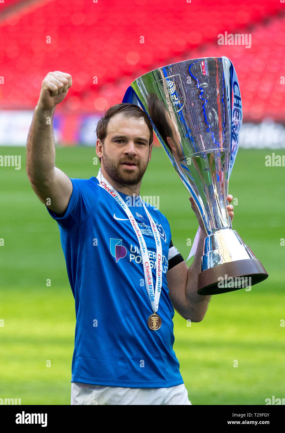 Brett Pitman of Portsmouth celebrates after the team win the trophy ...