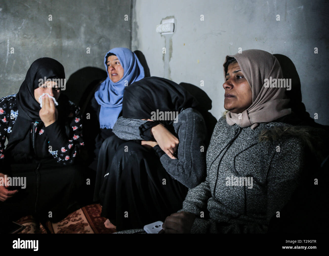 Relatives to the deceased seen mourning during the funeral. Palestinian ...