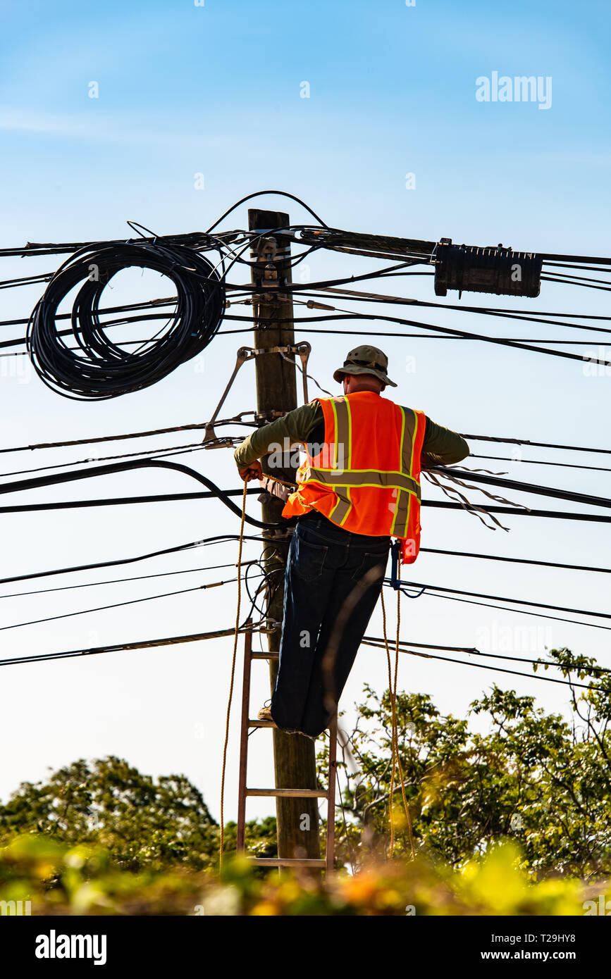 Electrical Lineman at work Stock Photo - Alamy