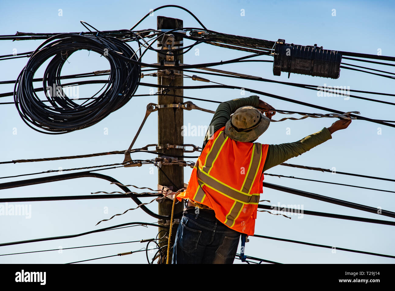 Electrical Lineman Pole Stock Photos & Electrical Lineman Pole Stock ...