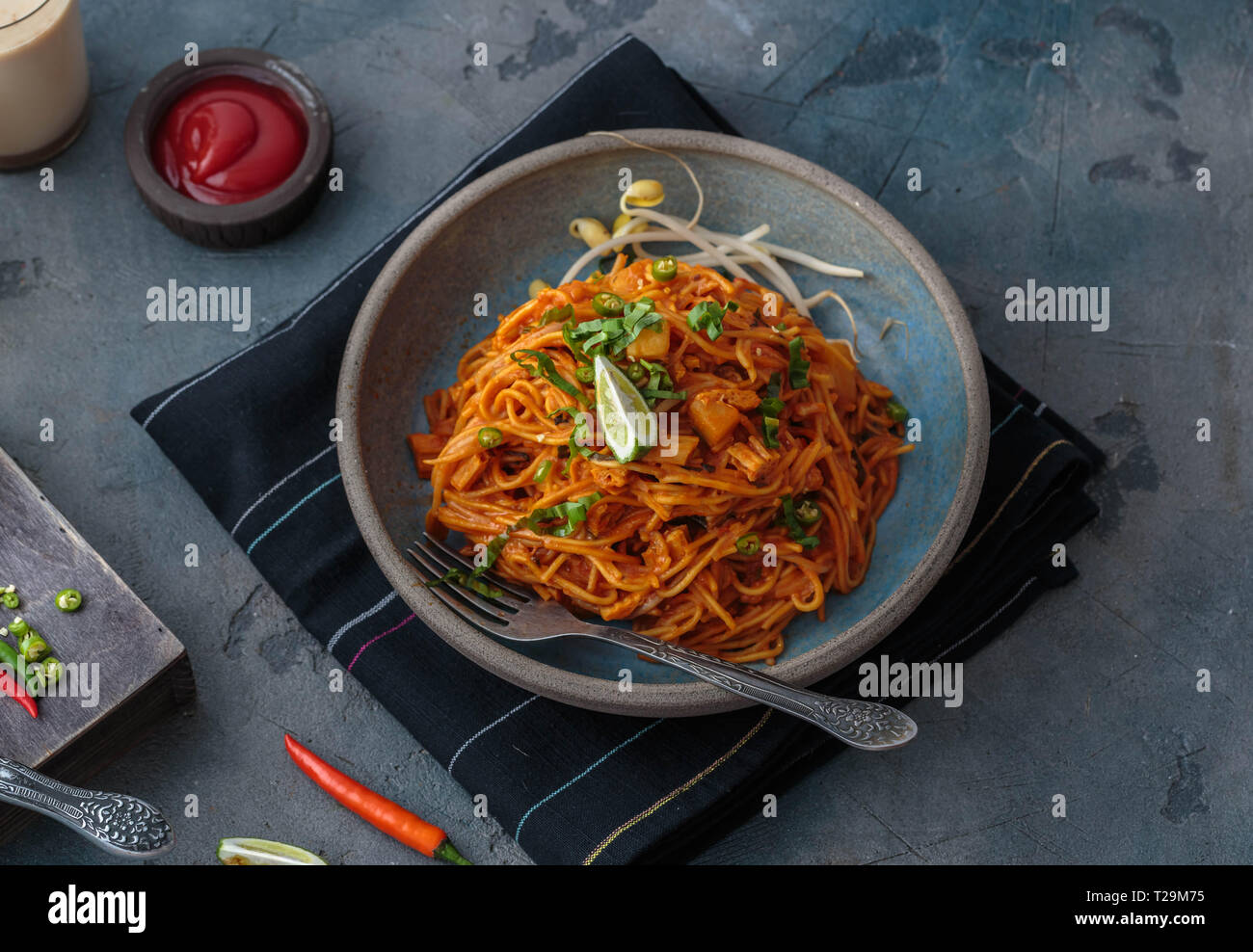 Spicy mee goreng mamak, malaysian or singaporean fried noodles with ...