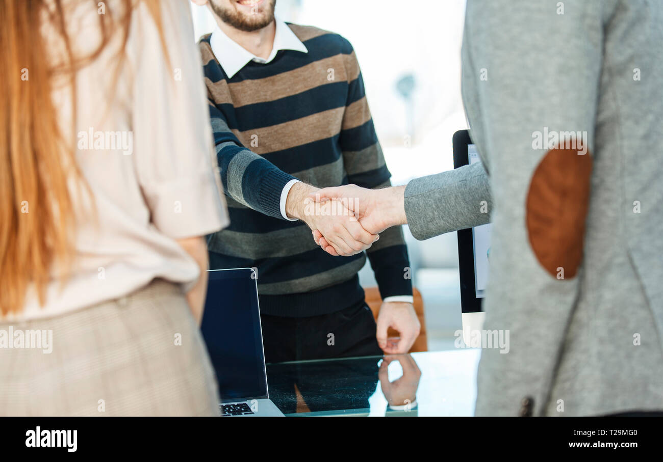 Handshake between manager client hi-res stock photography and images ...