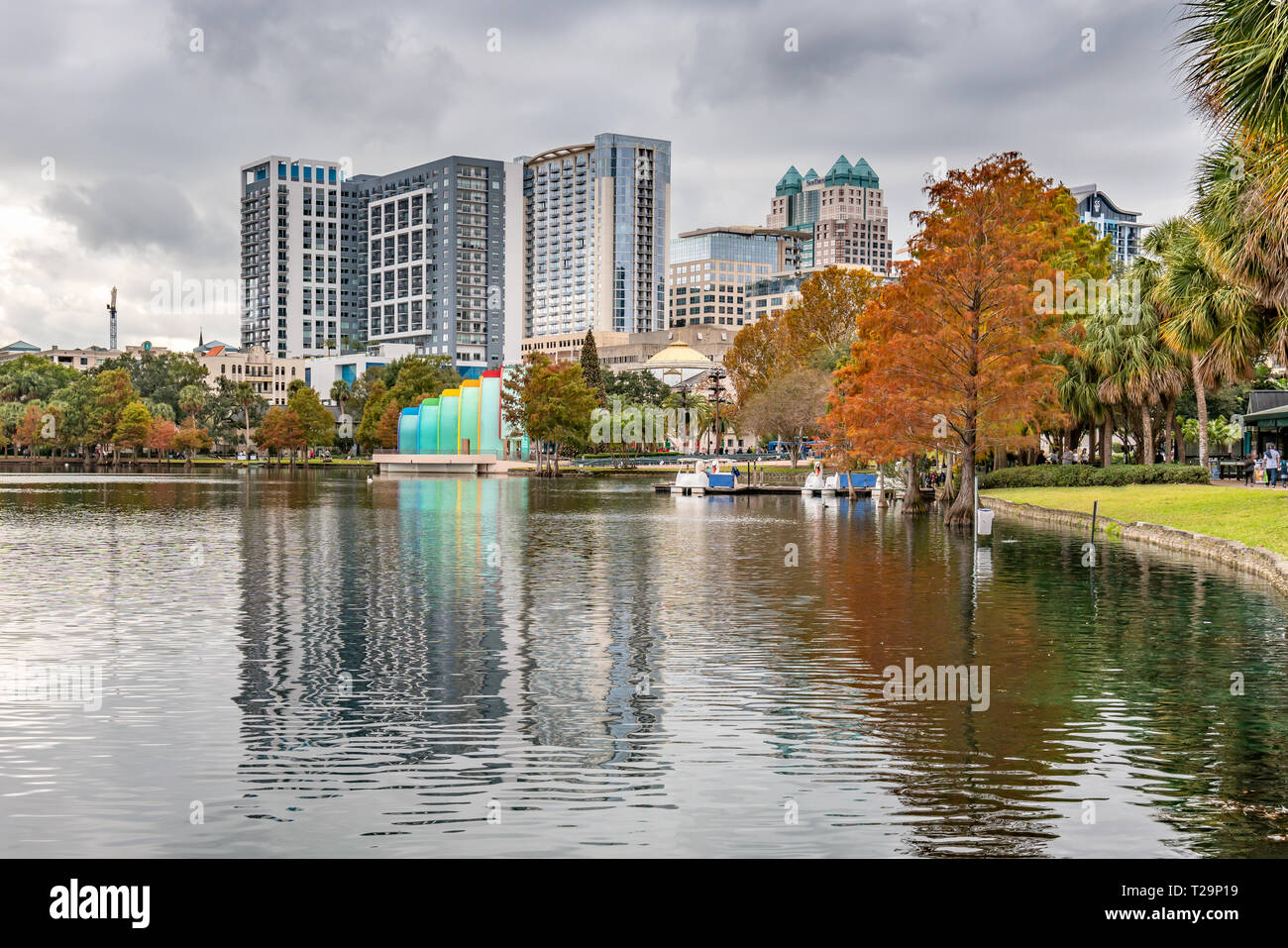 ORLANDO, FLORIDA, USA - DECEMBER, 2018: Eola Lake Park with vibrant ...
