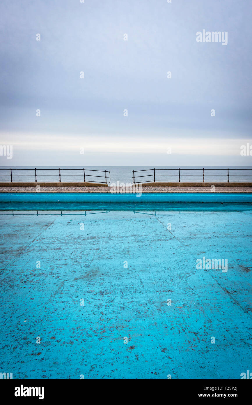 swimming paddling pool in winter on Llandudno sea front North wales ...