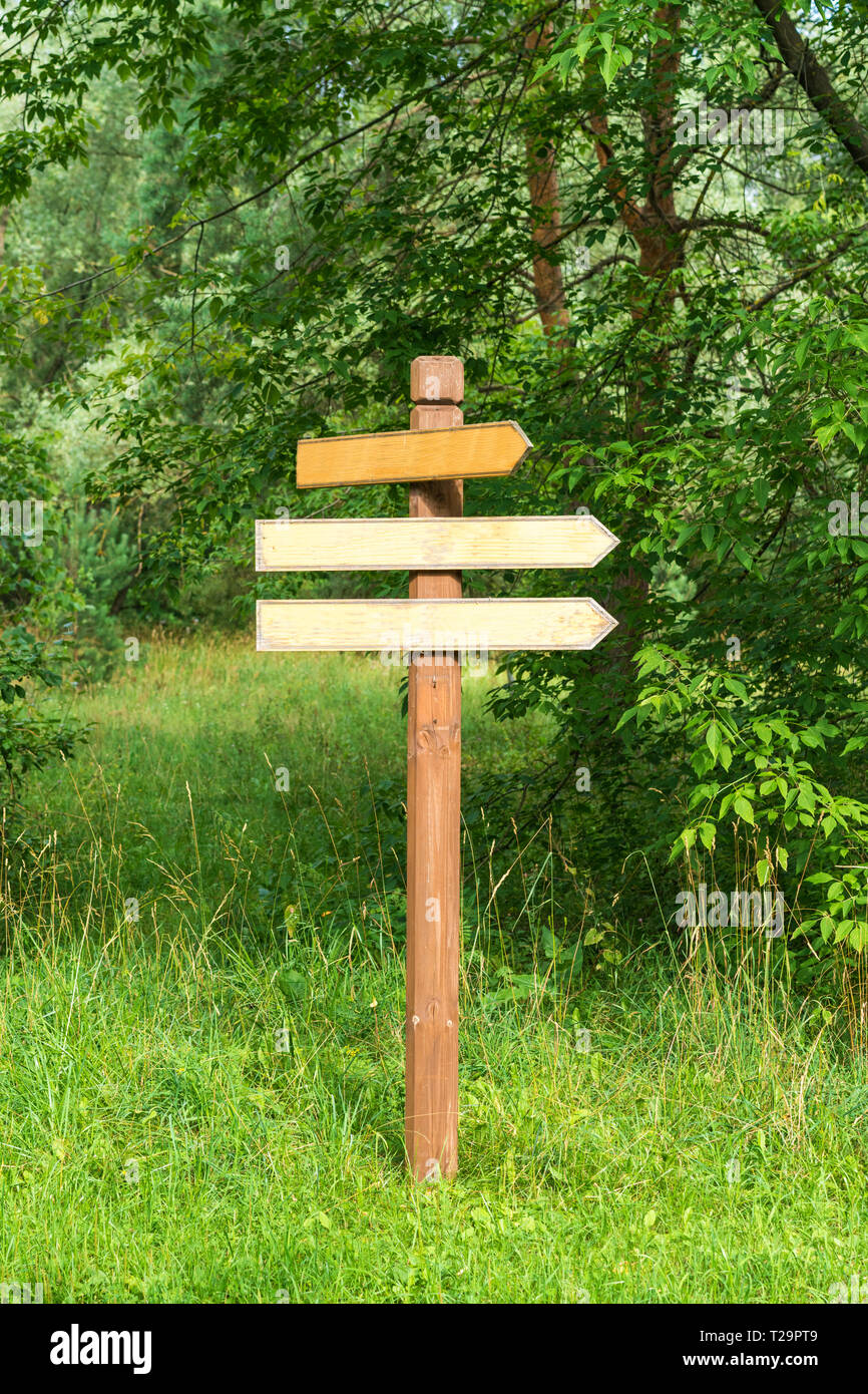 direction signs in the park Stock Photo - Alamy
