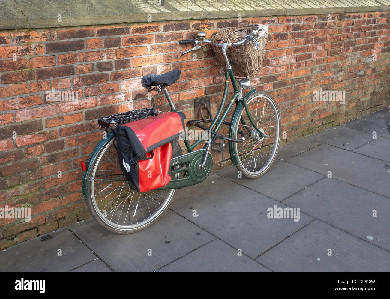 Bicycle against a wall Stock Photo - Alamy