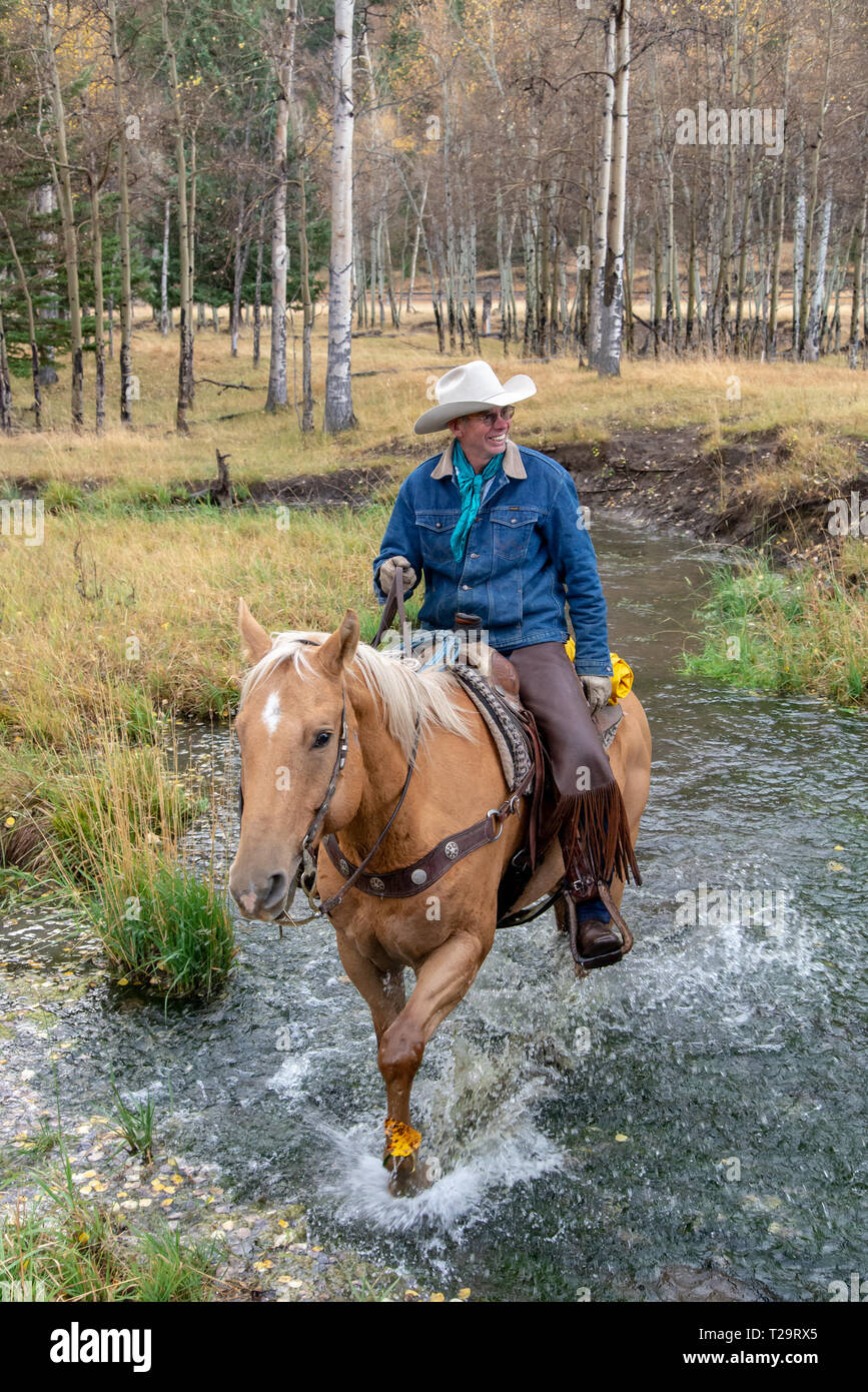 Slicker cowboy hi-res stock photography and images - Alamy