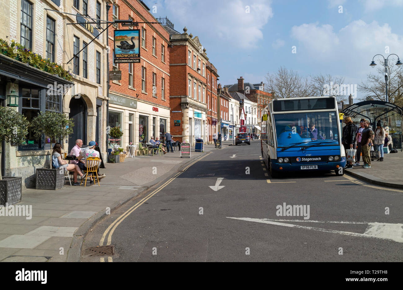 Devizes, Wiltshire, England, UK. March 2019. Passengers boarding a town ...