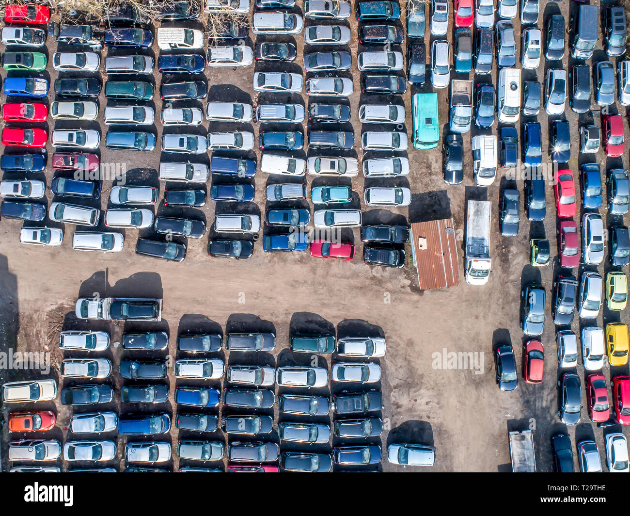 Lines of crushed cars wreck - in scrapyard before being shredded ...