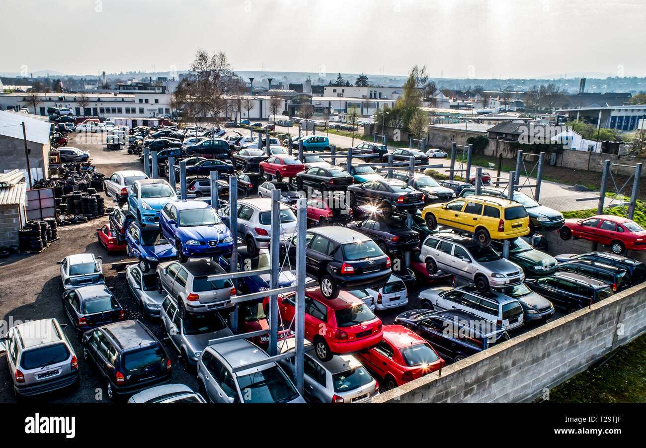 Lines of crushed cars wreck - in scrapyard before being shredded ...