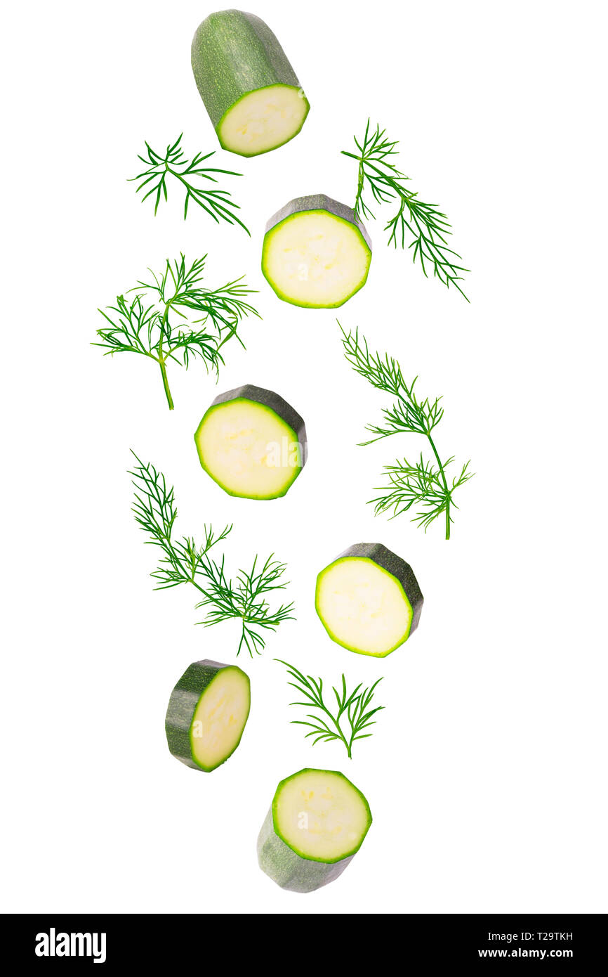 Flying vegetables and herbs concept. Fresh organic zucchini and dill ...