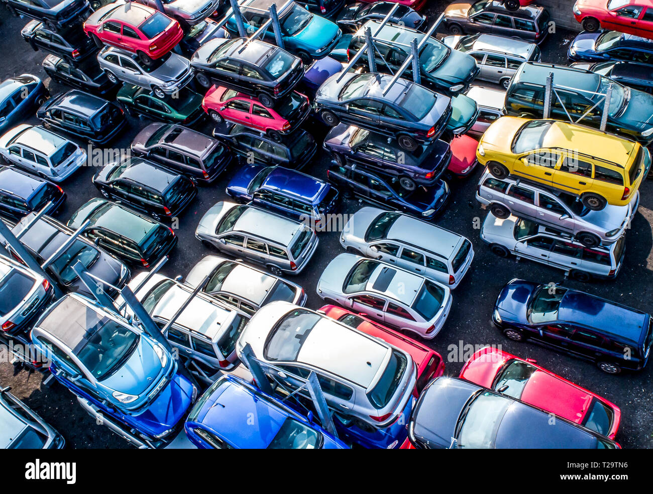 Lines of crushed cars wreck - in scrapyard before being shredded ...