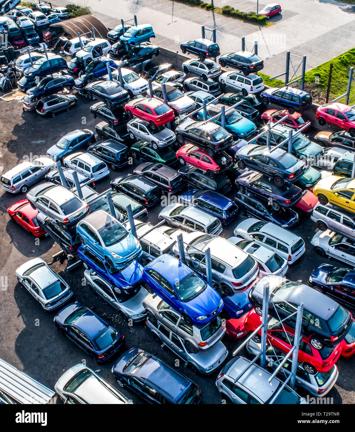 Lines of crushed cars wreck - in scrapyard before being shredded ...