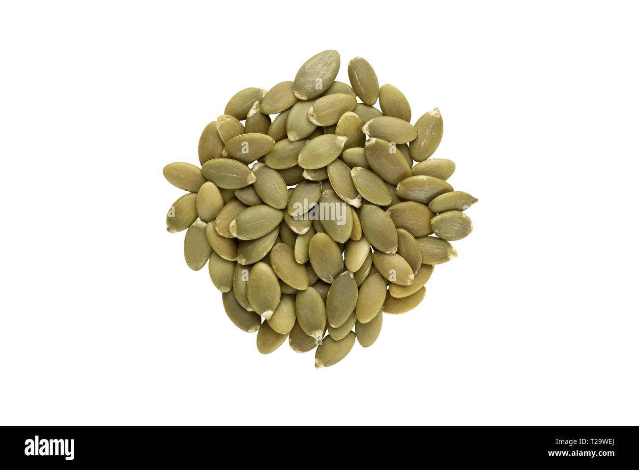 Shelled pumpkin seeds or pepitas, isolated on white background Stock ...