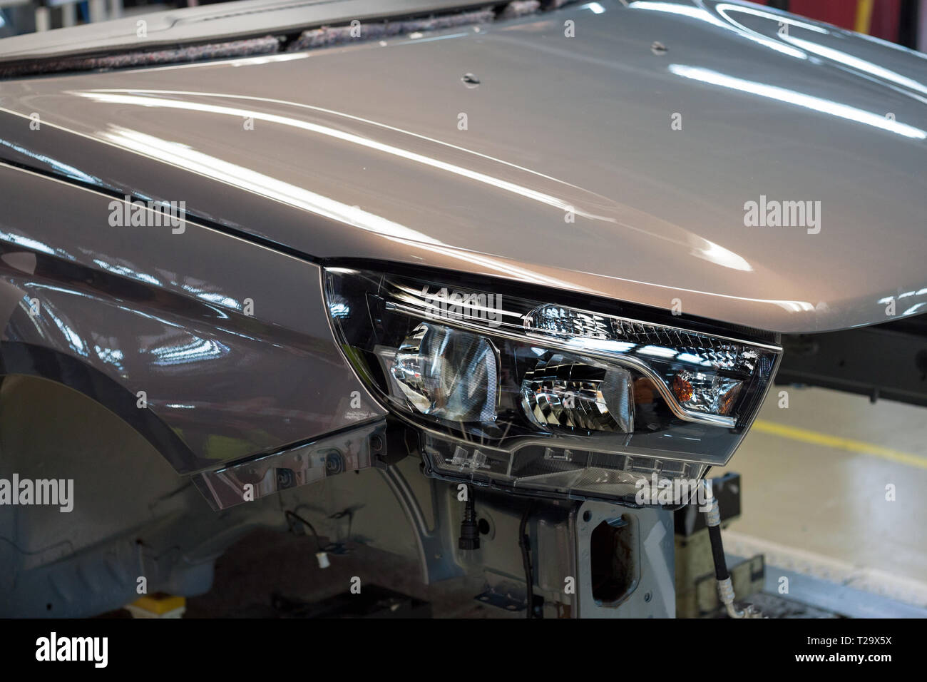 Headlight manufacturing hi-res stock photography and images - Alamy