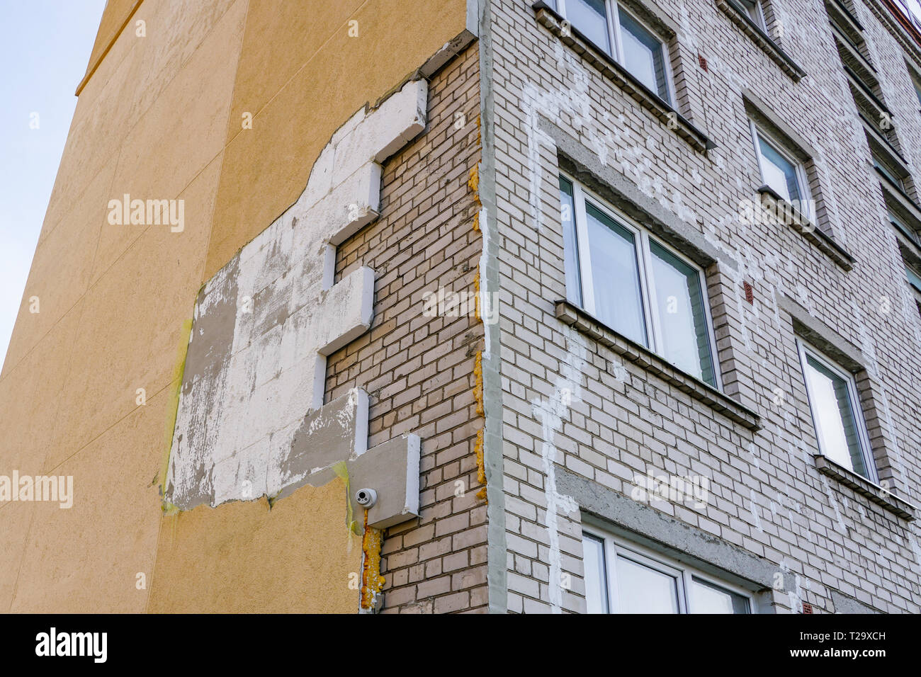 strong wind or poor quality of work damaged apartment building thermal ...