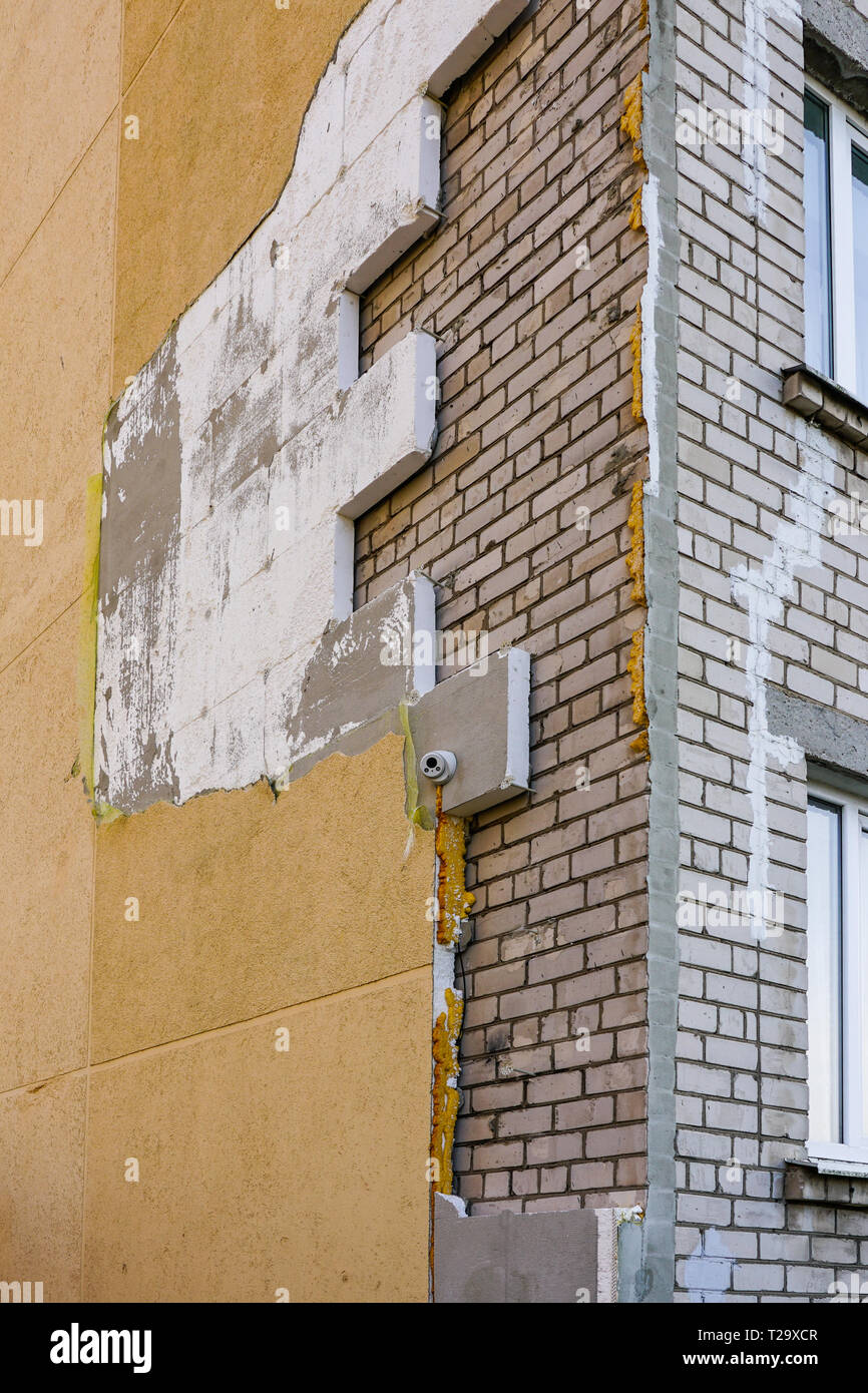 strong wind or poor quality of work damaged apartment building thermal ...