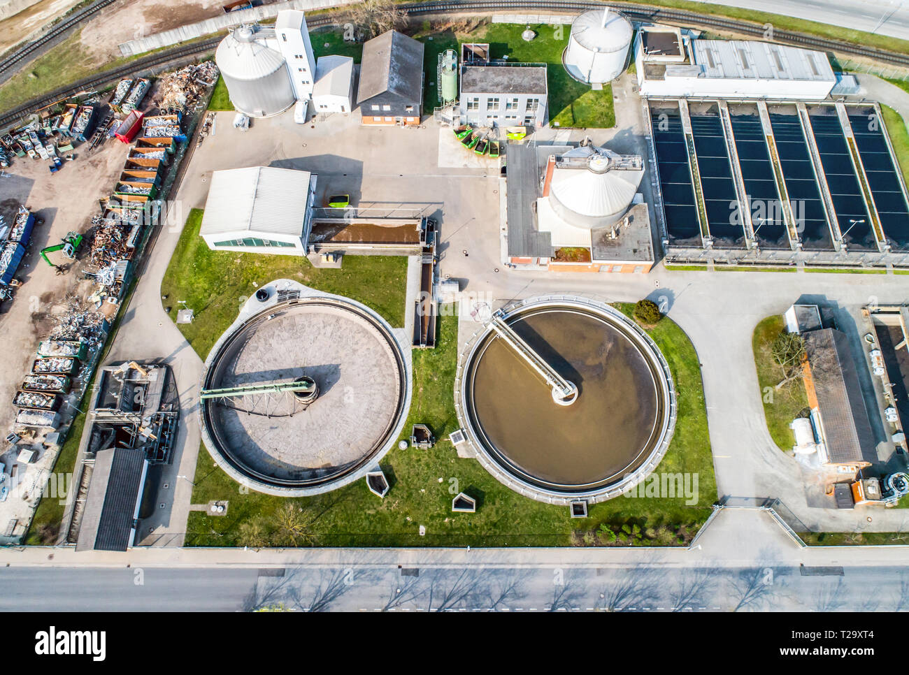 Aerial view of modern industrial sewage treatment plant beside the ...