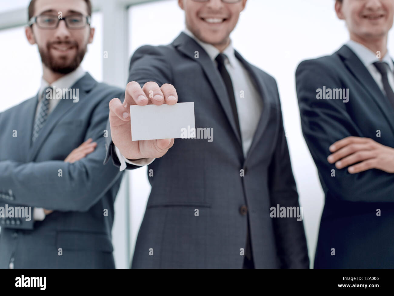 business team leader showing business card Stock Photo - Alamy