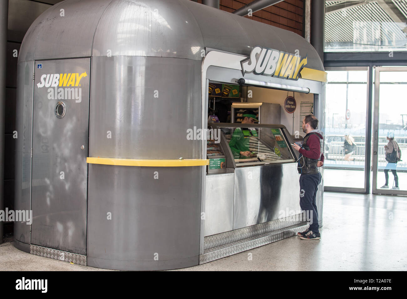 North Greenwich station, London, UK - March 2019: A compact subway ...