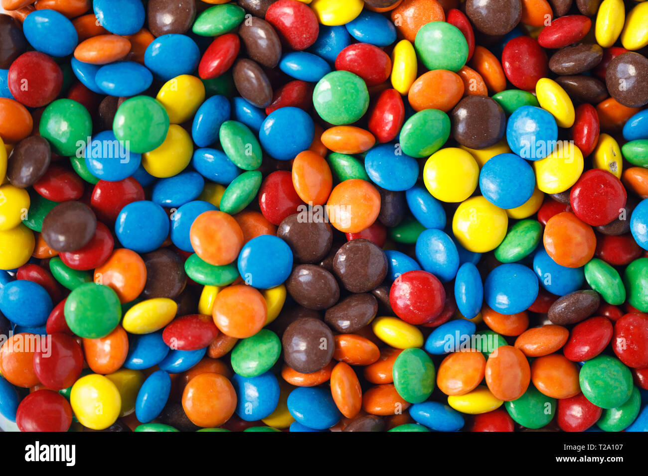 Multi colored smarties as a background Stock Photo - Alamy