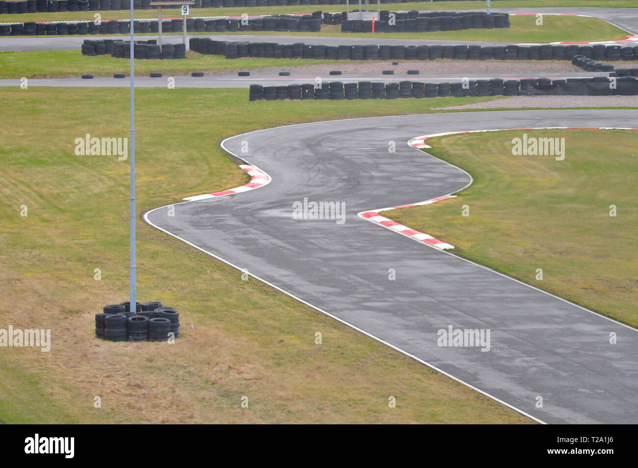 S-shaped curve and U-turn on a carting track Stock Photo - Alamy