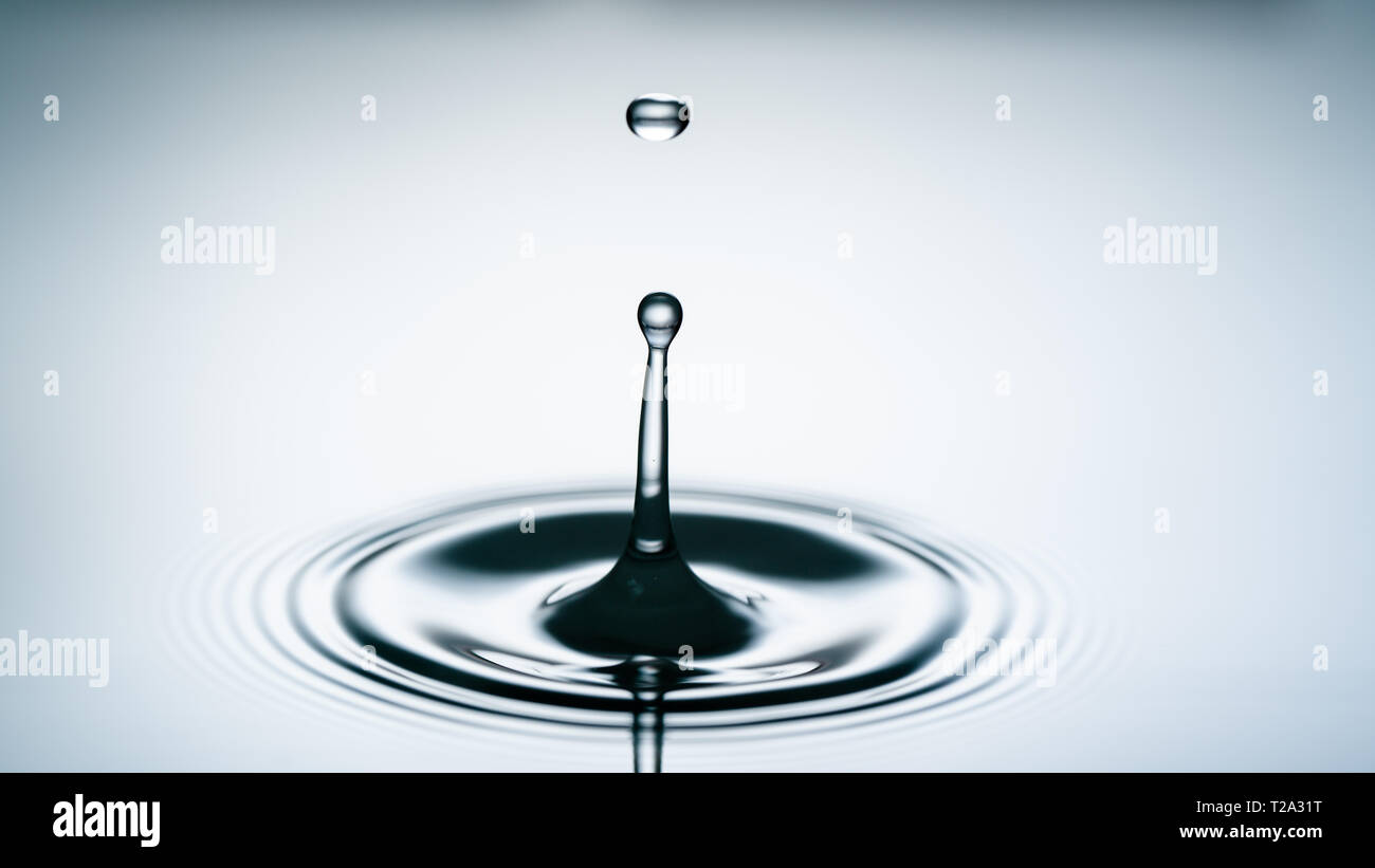 water drop collision. Water splash Stock Photo - Alamy