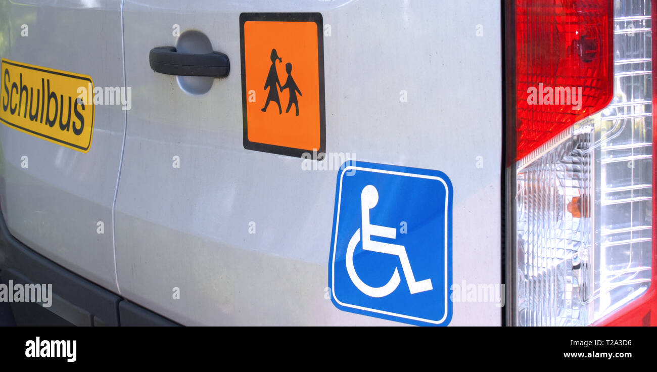Close-up of signs on a school bus for handicapped children in Germany ...