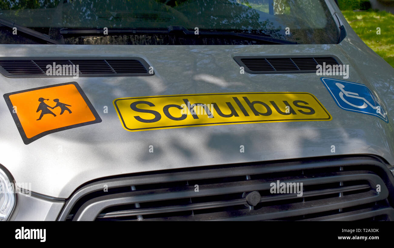 Close-up of signs on a school bus for handicapped children in Germany ...