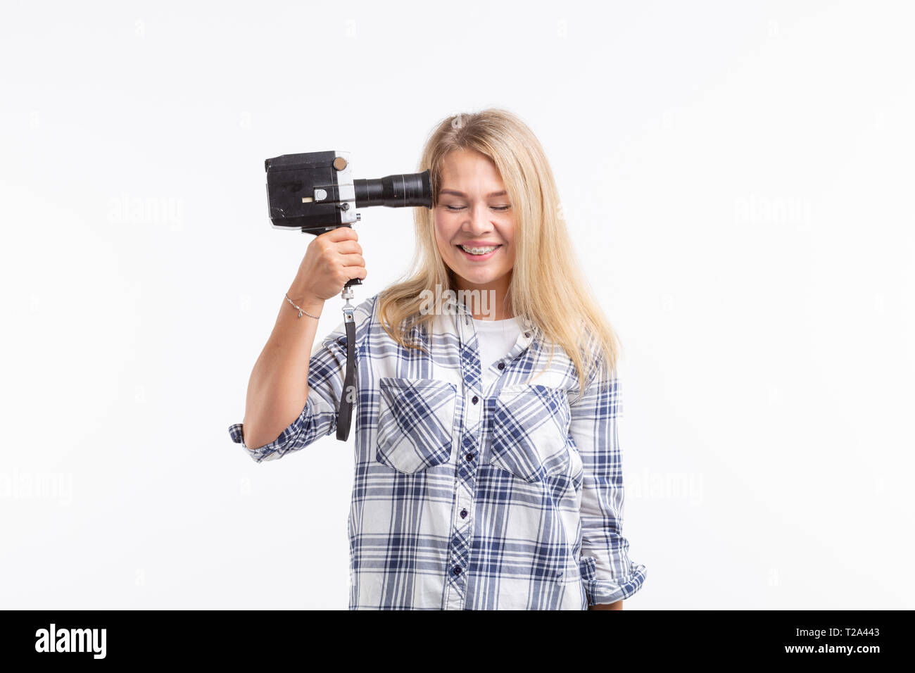 Joke, photo and gesture concept - young funny silly woman posing with ...