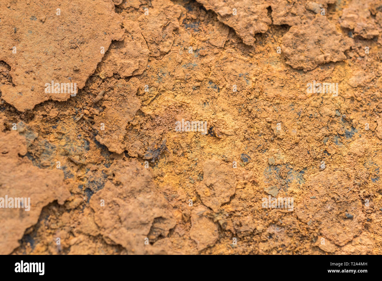 Close-up of rusty deposit on the top of an industrial metal barrel ...