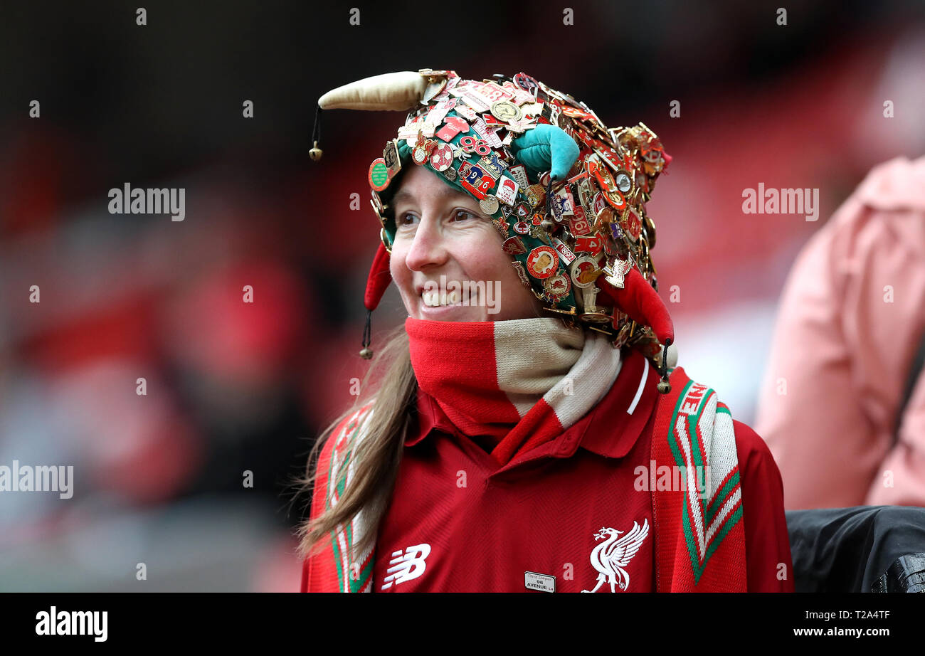A Liverpool fan in the stands shows her support during the Premier ...
