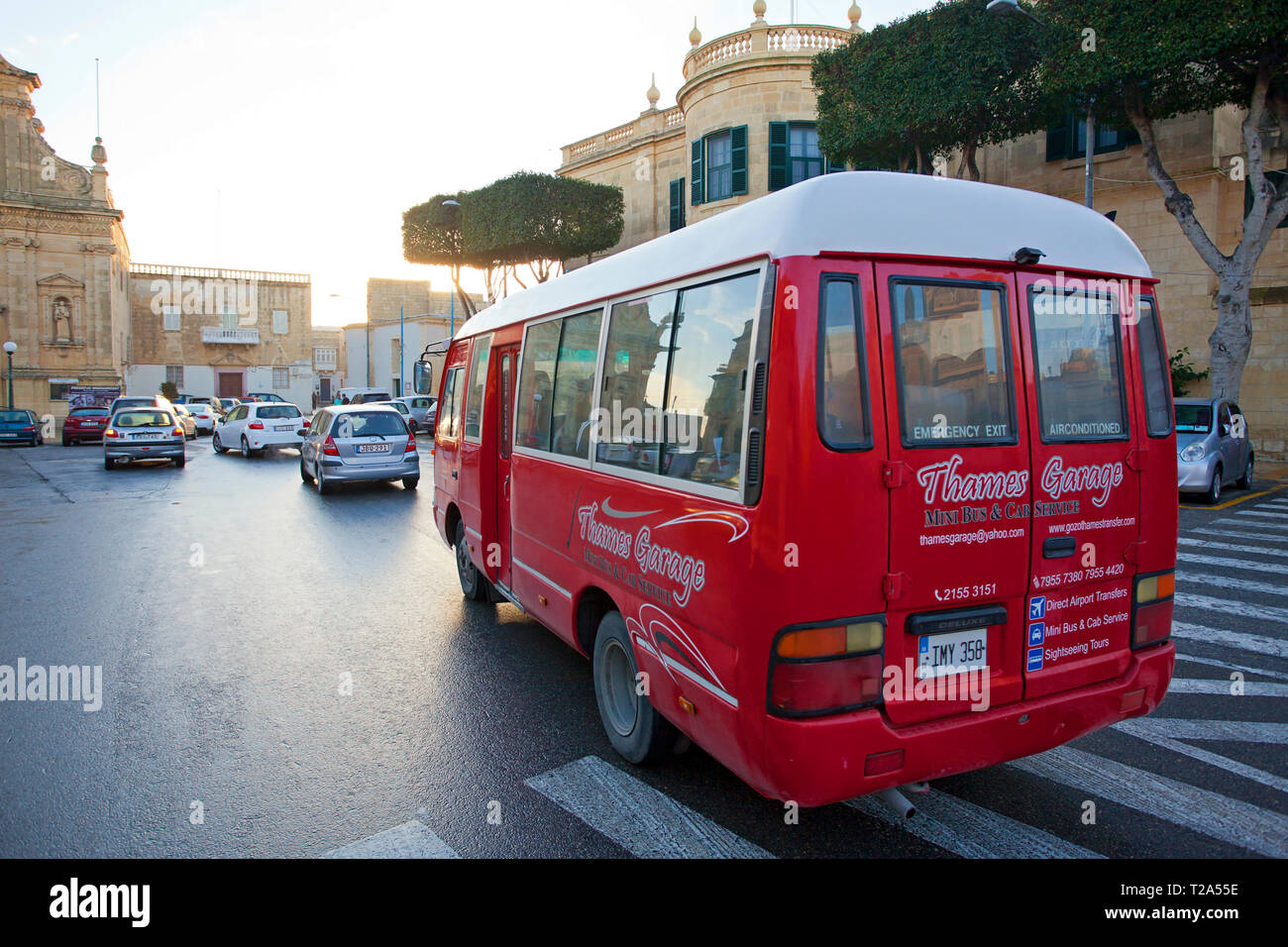 Red van and cars, St Francis Square, Gozo, Malta Stock Photo - Alamy