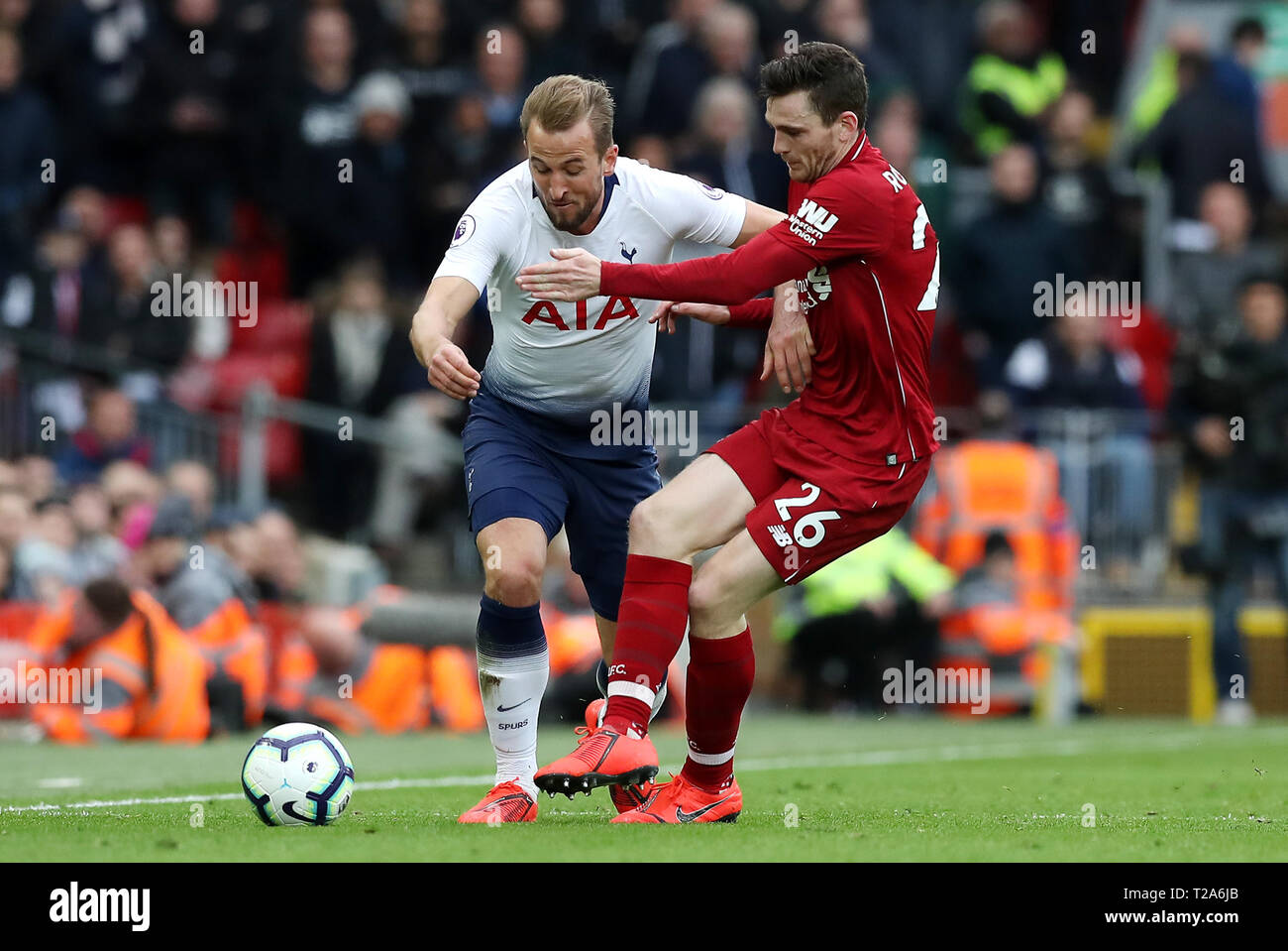 Tottenham Hotspur's Harry Kane (left) and Liverpool's Andrew Robertson ...
