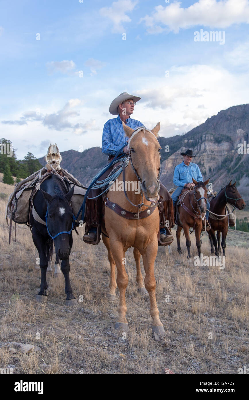 Two Cowboys Riding Horses High Resolution Stock Photography and Images ...