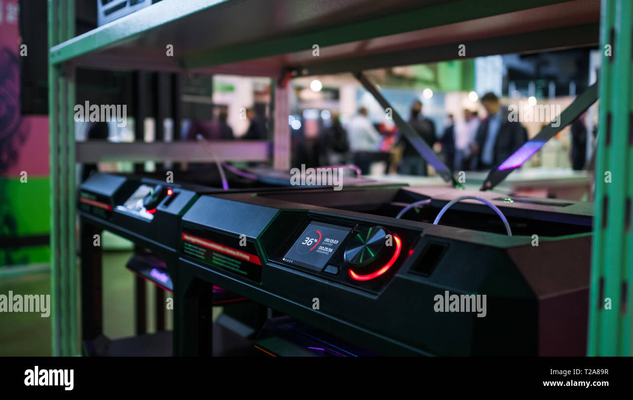 Automatic 3D printer machines working at modern technology exhibition ...