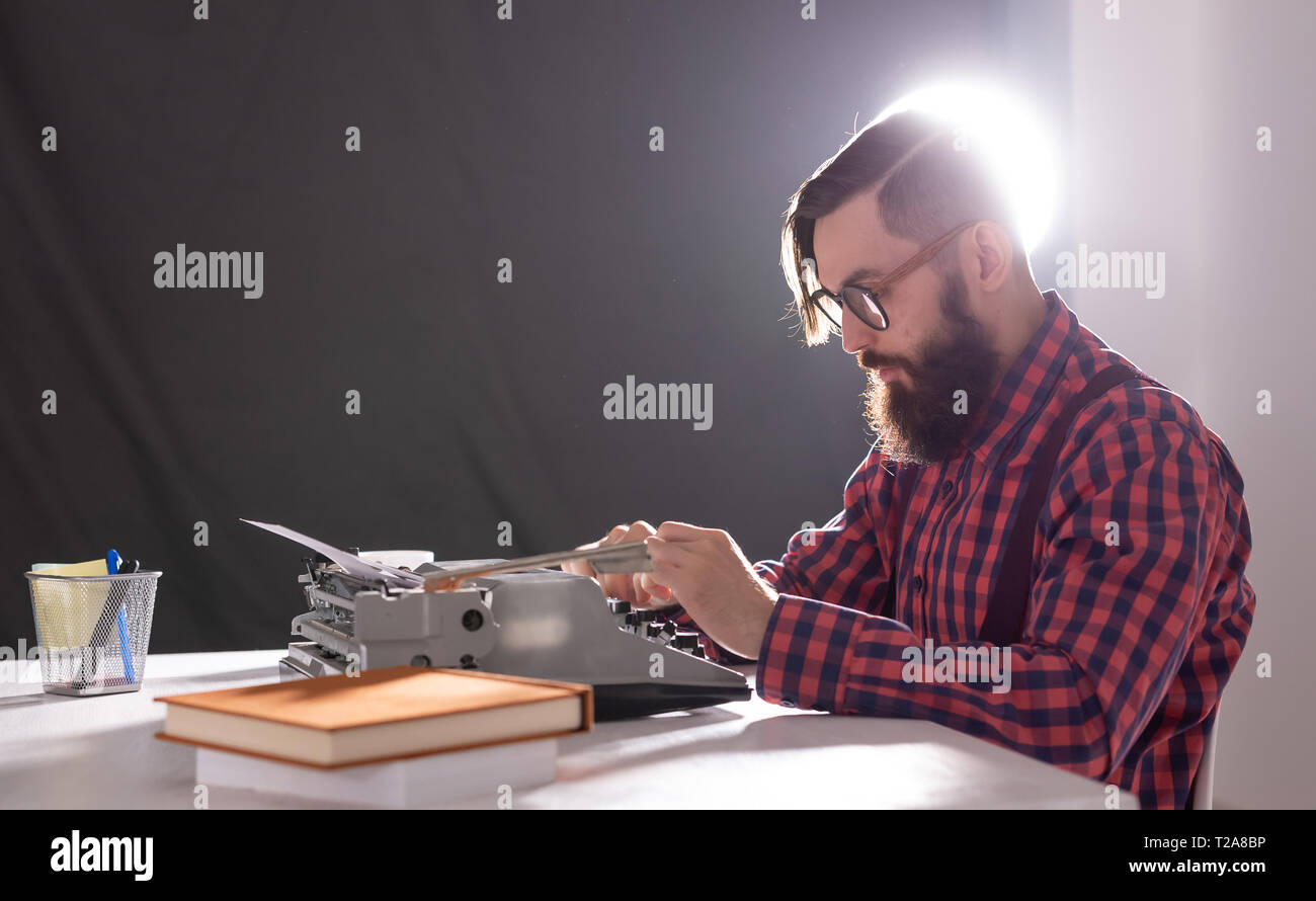 people, writer and hipster concept - young stylish writer working on ...